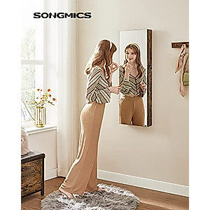 SONGMICS Jewelry Cabinet Armoire, Lockable Wall-Mounted Storage Organizer Unit with 2 Plastic Cosmetic Trays, Full-Length Frameless Mirror, Textured Brown UJJC001X01