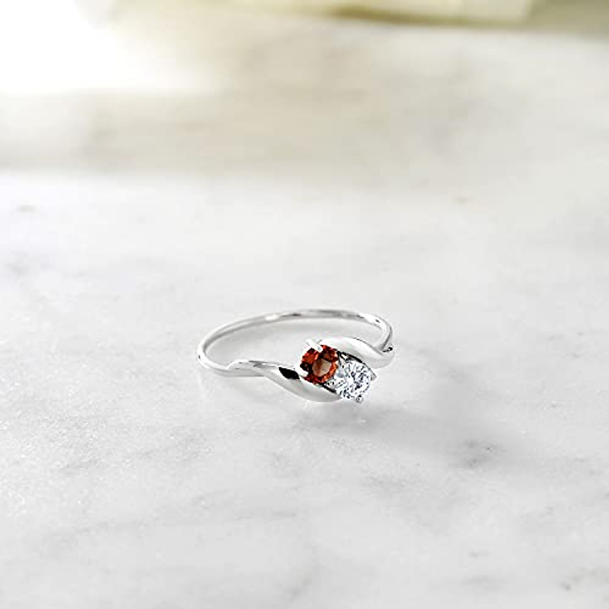 Gem Stone King 10K White Gold 2-Stone Engagement Ring Round Red Garnet and Moissanite (0.36 Cttw) (Size 7)