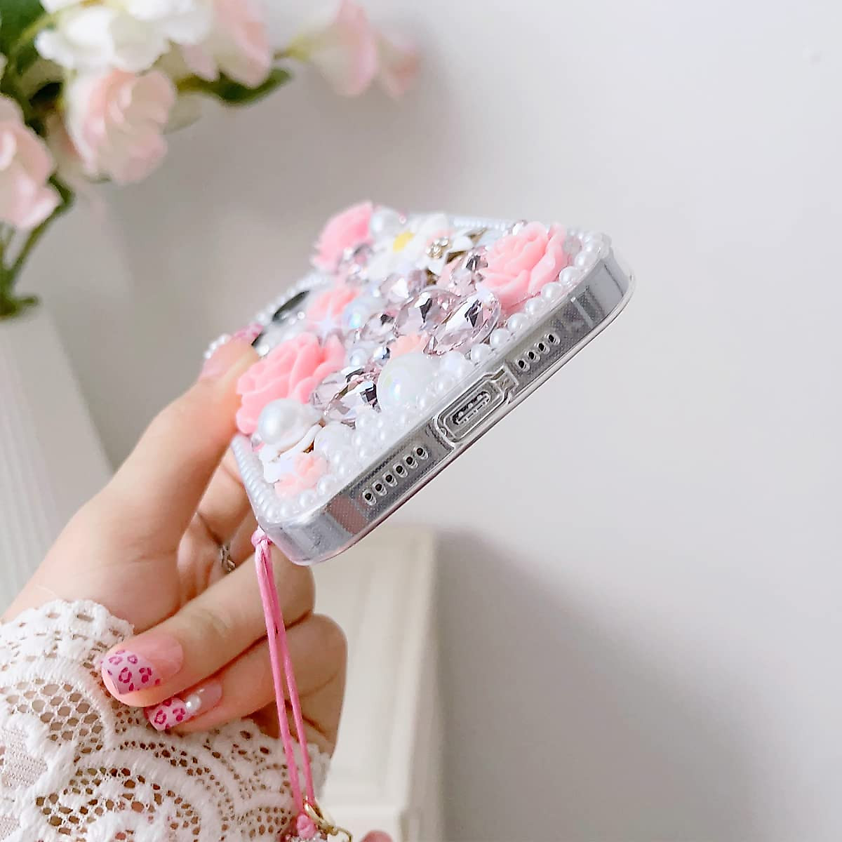 Changjia for iPhone 13 Pro Max Glitter Bling Case, Cute Luxury 3D Crystal Rhinestone Flowers Diamond Pearl with Wrist Strap Bracelet Chain Women Girls Case Cover for iPhone 13 Pro Max 6.7Inch (Pink)