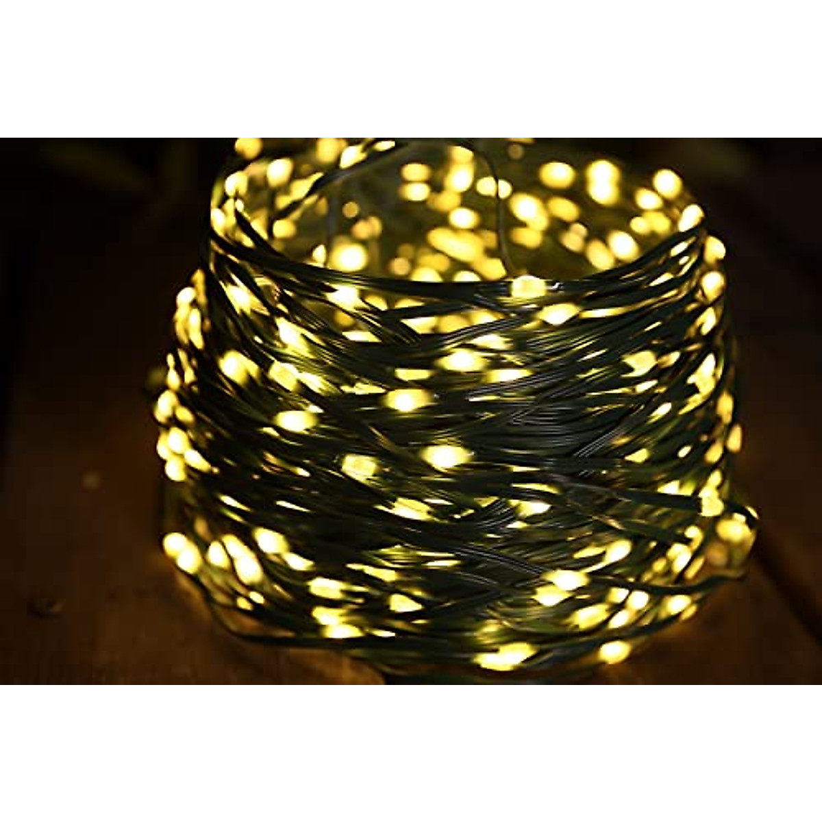 SUNILLUMA Outdoor Solar Fairy Lights - 300 LED 100FT Strong PVC Wire with 8 Functions by Remote, Waterproof, Warm White Lights and Green Wire, Great for Party, Garden and Holiday Decoration