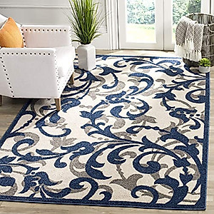SAFAVIEH Amherst Collection Area Rug - 5'3" x 8', Ivory & Navy, Floral Scroll Design, Non-Shedding & Easy Care, Ideal for High Traffic Areas in Living Room, Bedroom (AMT428M)