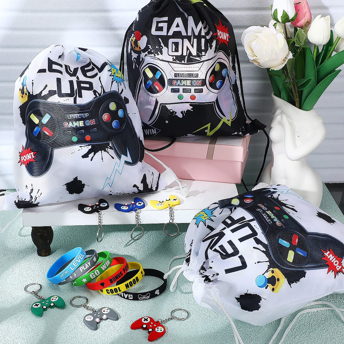 Nosiny 72PCS Video Game Party Favors Birthday Include 24 Video Game Goodie Drawstring Bags 24 Silicone Bracelet 24 Controller Keychain for Kids for Party Supplies (Black, White, Cute)