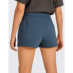 CRZ YOGA Stretch Shorts for Women Work Casual 2.5'' - Athletic Shorts with Pockets for Workout Travel Hiking Golf Slate Blue Large