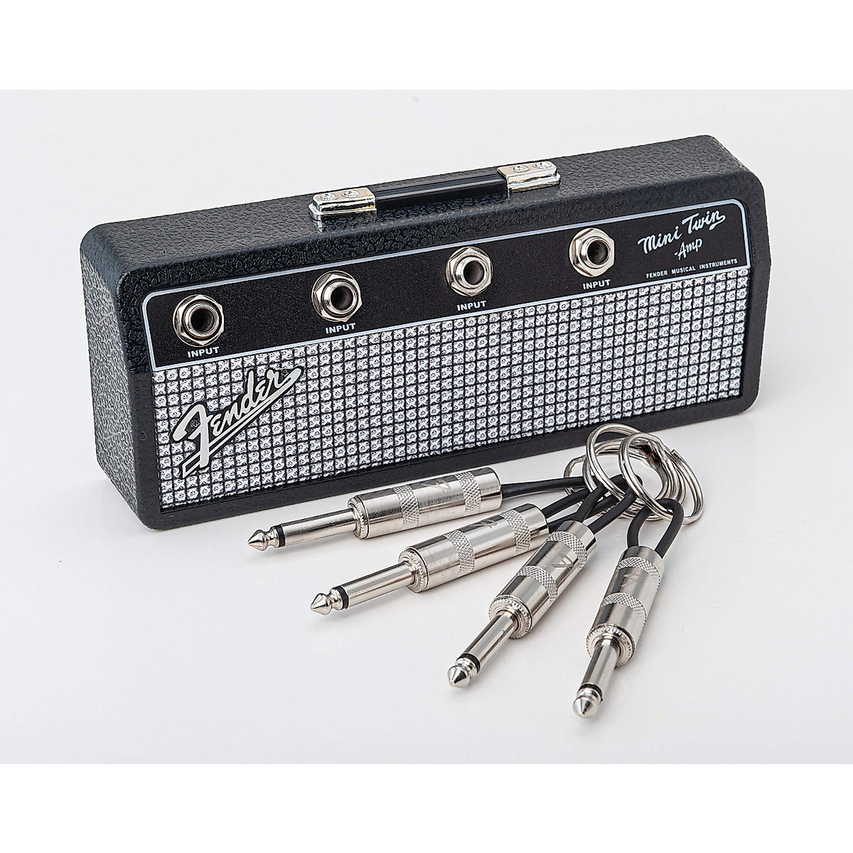 Licensed Fender Jack Rack- guitar amp key holder, includes 4 guitar plug keychains and 1 wall mounting kit. Quick and easy installation.