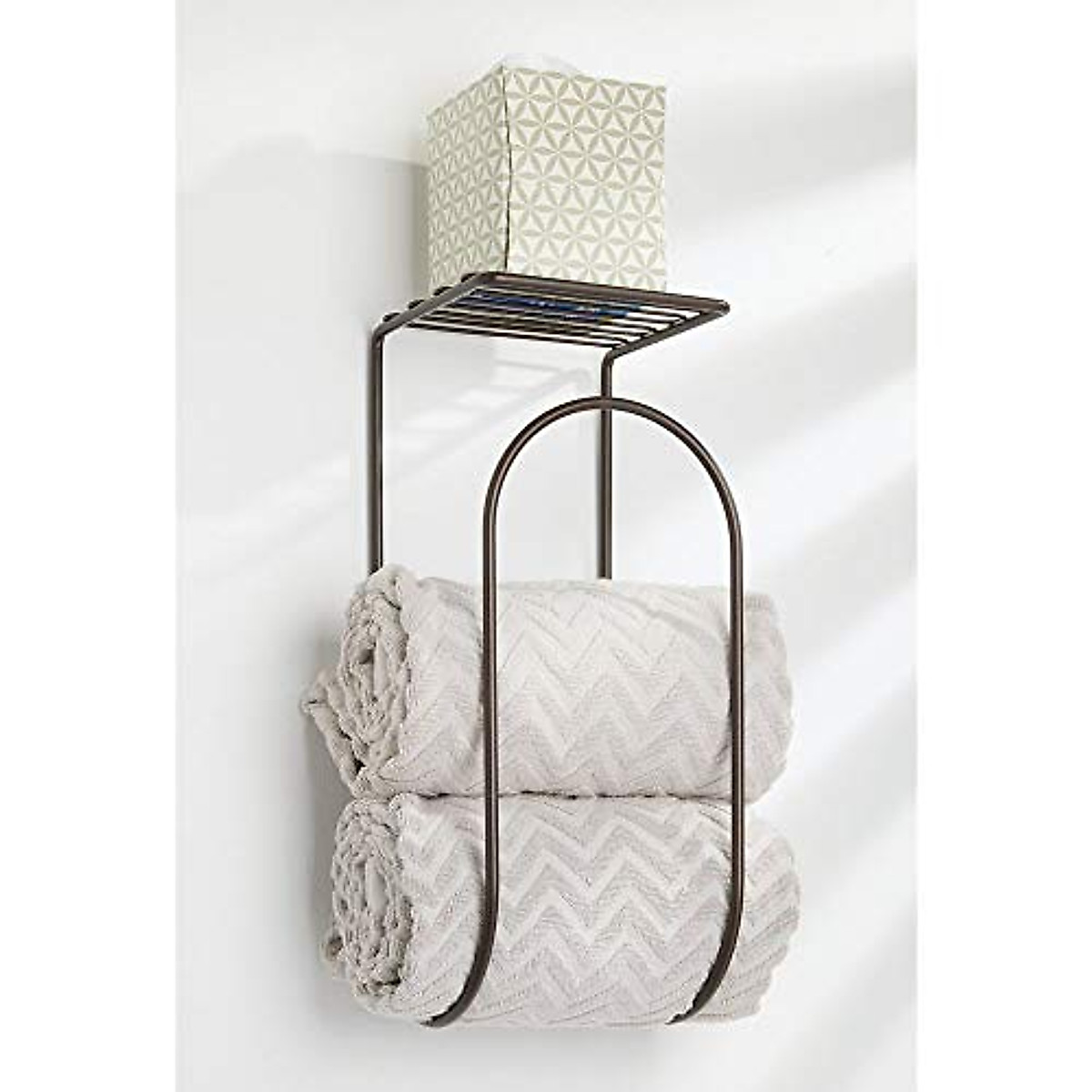 mDesign Modern Metal Wire Wall Mount Towel Rack Holder and Organizer with Storage Shelf - for Bathroom Towels, Washcloths, Hand Towels - Decorative Curved Design - Bronze