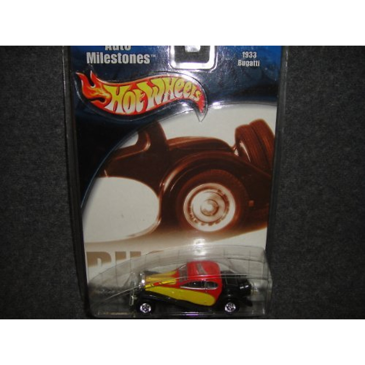 HOT WHEELS AUTO MILESTONES YELLOW AND RED 1933 BUGATTI DIE-CAST COLLECTIBLE