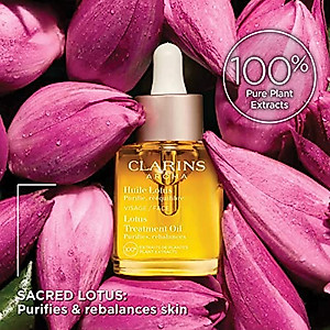 Clarins Lotus Face Treatment Oil | Hydrates, Tones and Balances Skin| Minimizes Fine Lines | Skin Is Immediately Velvety* | 100% Natural Plant Extracts | Oily To Combination Skin Types | 1 Fluid Ounce