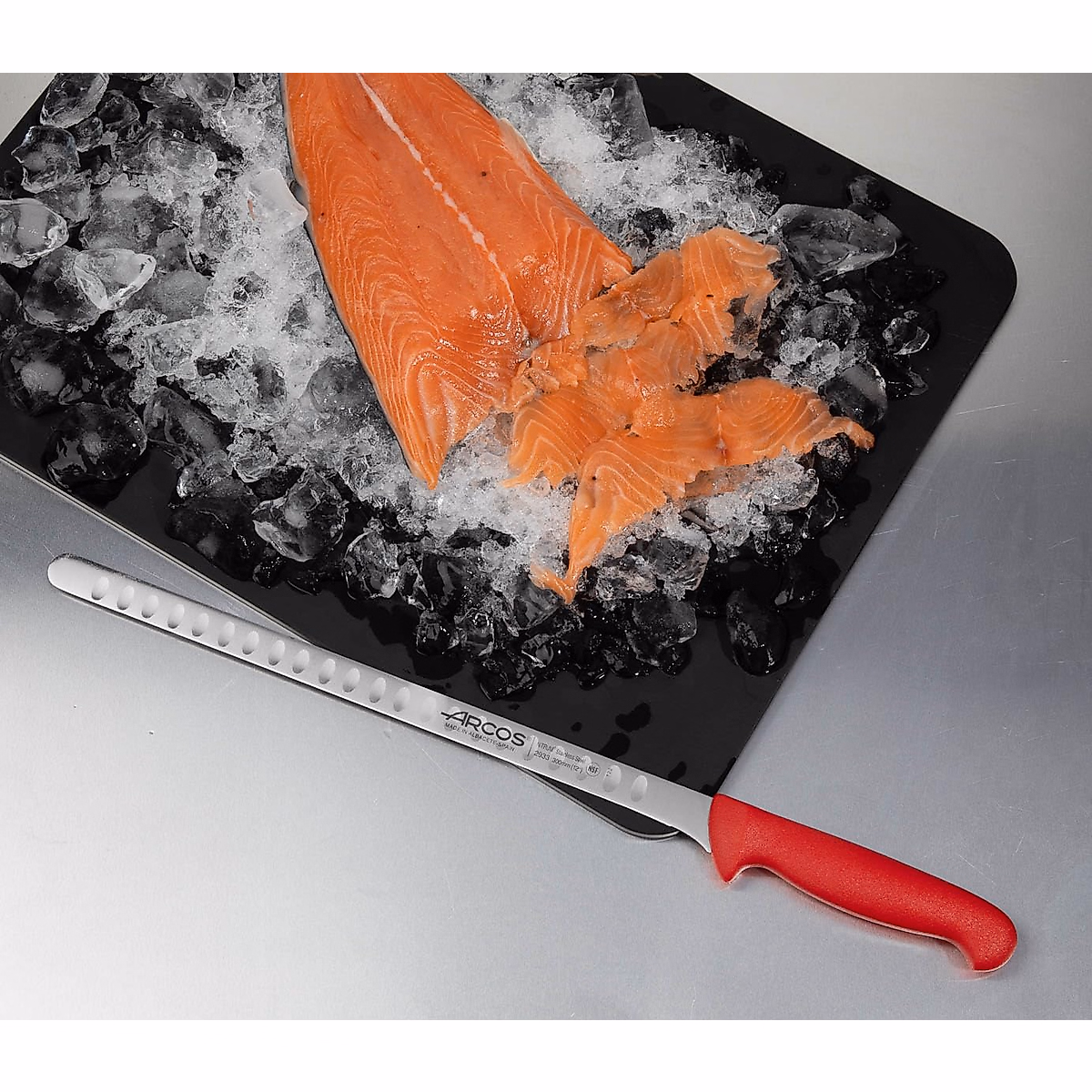ARCOS Salmon Knife/Fish Knife 12 Inch Nitrum Stainless Steel and 300 mm blade. Ergonomic Polypropylene Handle. Series 2900. Features different handle colors to make it easier. Color Red.