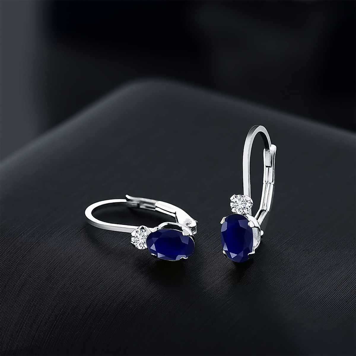 Gem Stone King 14K White Gold Blue Sapphire and White Diamond Leverback Earrings For Women | 1.17 Cttw | Gemstone September Birthstone | Oval 6X4MM, Round 2MM | 3/4 Inch