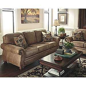 Signature Design by Ashley Larkinhurst Faux Leather Sofa with Nailhead Trim and 2 Accent Pillows, Brown