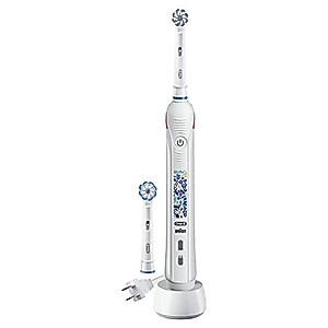Oral-B Kids Electric Toothbrush with Coaching Pressure Sensor and Timer, Rechargeable Toothbrush with (2) Brush Heads, Sparkle & Shine