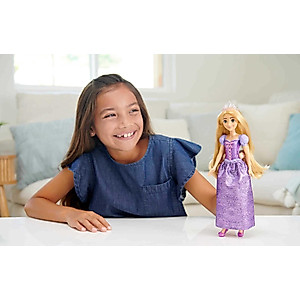 Mattel Disney Princess Toys, Rapunzel Fashion Doll, Sparkling Look with Blonde Hair, Blue Eyes & Tiara Accessory, Inspired by the Movie Tangled