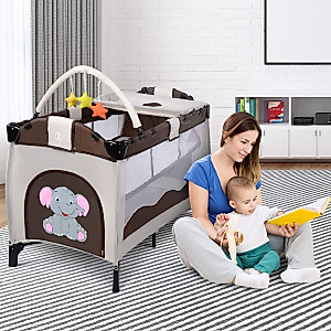 BABY JOY 3 in 1 Pack and Play, Portable Playard with Hanging Toys, 2 Lockable Wheels Diaper Changing Table, Foldable Travel Bassinet Bed (Coffee)