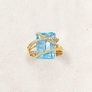 Ross-Simons 9.25 Carat Sky Blue Topaz and .15 ct. t.w. Diamond Crisscross Ring in 14kt Yellow Gold. Size 7