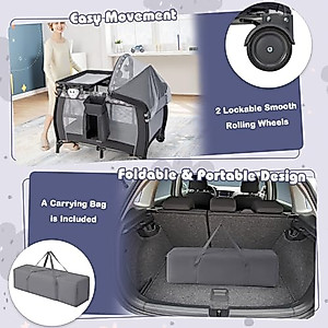 HONEY JOY Pack and Play with Bassinet, 4-in-1 Portable Baby Playard with Changing Table, Net & Cute Toys, Diaper Storage Bag, Music Box, Wheels with Brake, Foldable Newborn Play Yard w/Carry Bag