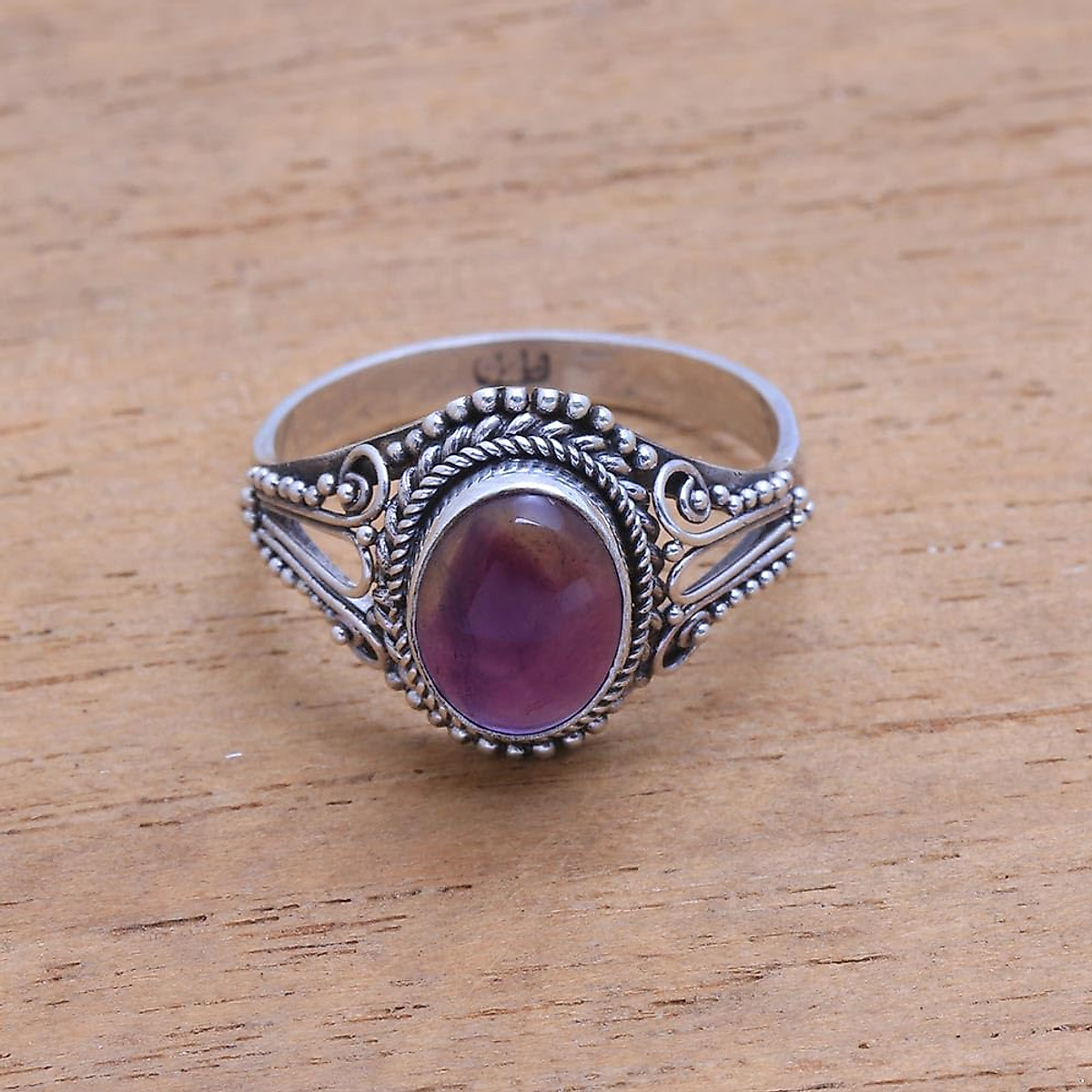 NOVICA Artisan Handmade Amethyst Singlestone Ring from Bali Sterling Silver Indonesia Birthstone Gemstone [ring Front 0.6 in H x 0.4 in W x 0.3 in D Band Width 3 mm W] ' Princess Gem'