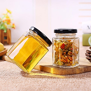 Woaiwo-q 6 oz Hexagon Glass Honey Jars, Glass Jars with Black Lids,Bronzy Bee Pendants,Wooden Honey Sticks,Small Tags,1.5m Jute Twine -Clear Hexagon Jars for Honey,Jams, Liquid.(25 Pcs)…