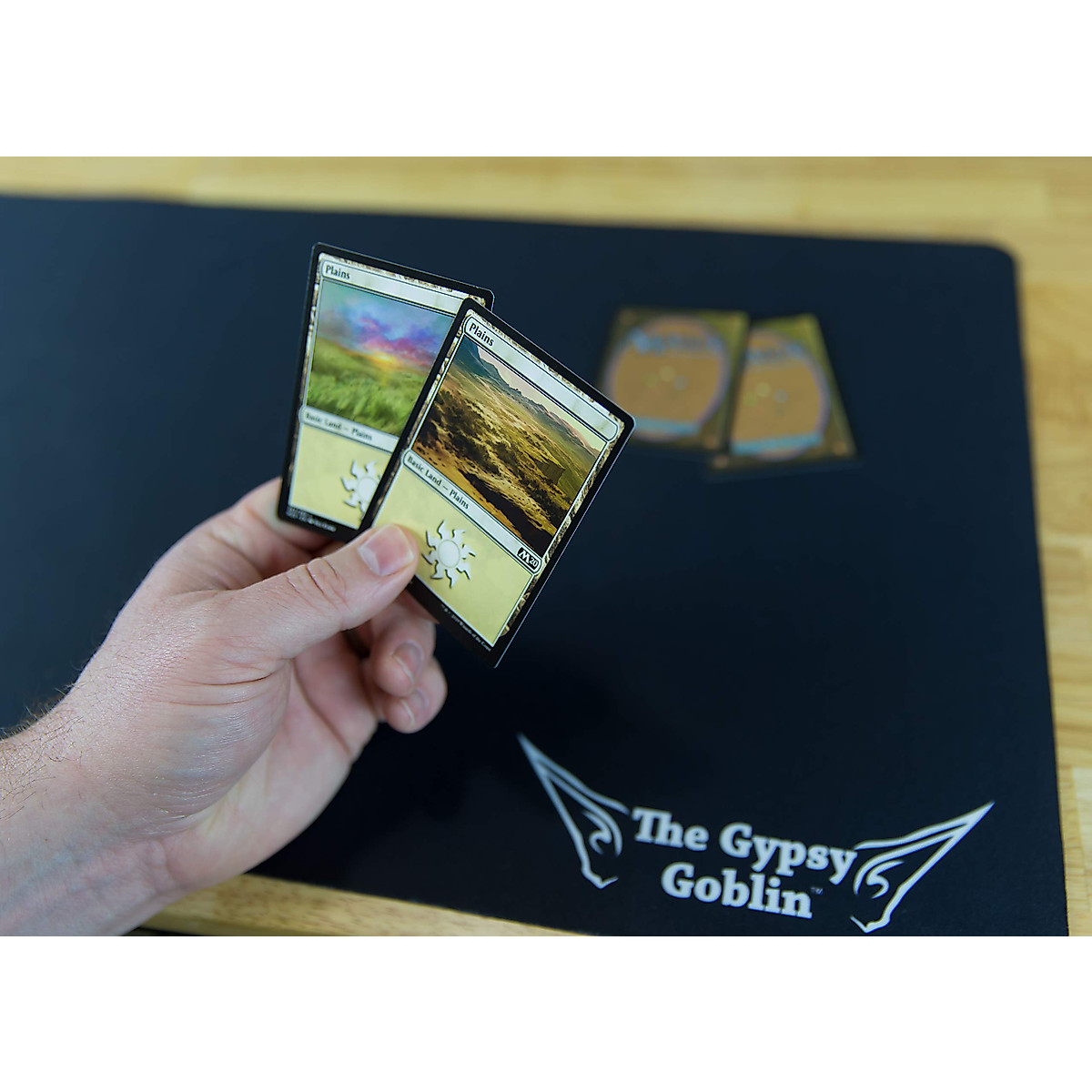 The Gypsy Goblin Black MTG Playmat for Card Games - 24”x13.5, Smooth Card Mat Protects Your Cards & Table