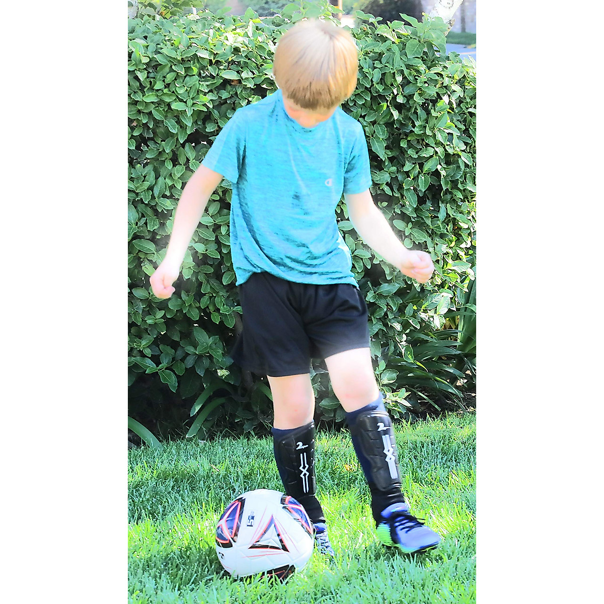 Kids Soccer Shin Guards with Adjustable Straps. Fits Ages 4-7. Black