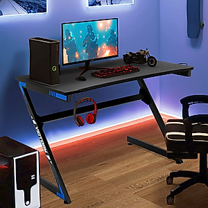 Cirstore Gaming Desk 39 Inch Computer Desk Gaming Table Z Shaped Pc Gaming Workstation Home Office Desk with Headphone, Gaming Controller Rrack,Black and Blue