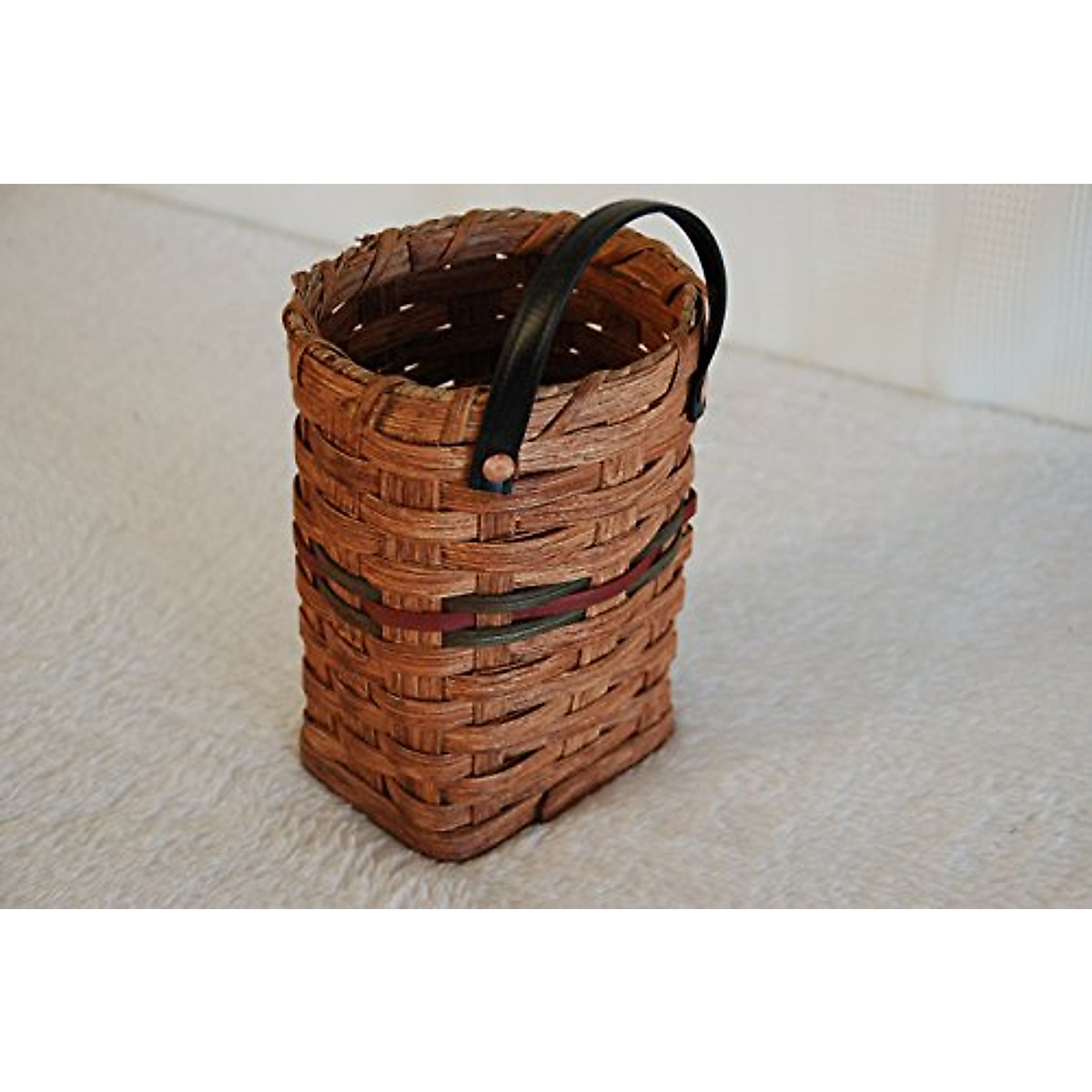 Hand Woven Utensil Wall Hanging Basket. This Cute Basket Is Handmade Locally Here in Ohio By the Local Amish. It Is a Very Handy Basket That Allows You to Store Your Utensils in a Basket on the Wall Saving Space on Your Counters. Measures: 4" X 3" X 8" Ta