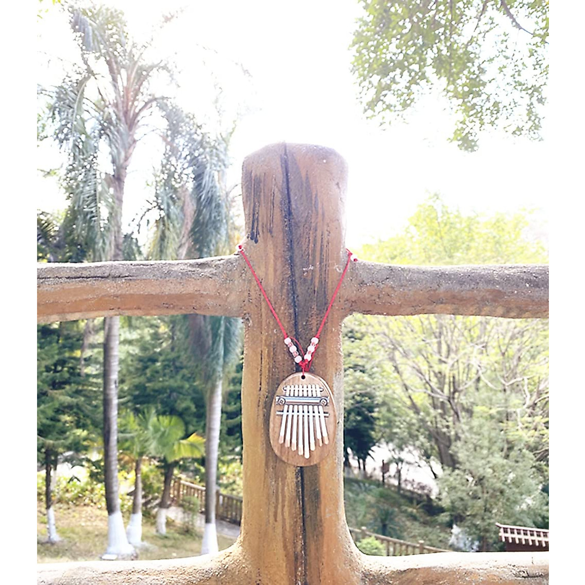 SLDHR Mini 8 keys Kalimba thumb piano, portable marimba music thumb piano pendant with lanyard, a unique gift for children, adults and beginners (Oval) (B11-1)