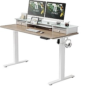 FEZIBO Electric Standing Desk with Glass Top Monitor Stand,55 x 26 Inch Adjustable Sit Stand Up Table with Double Drawer, Sit Stand Desk with Storage Shelf, White Frame/Light Walnut Top