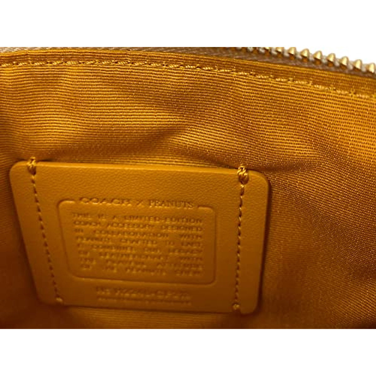 Coach X Peanuts Corner Zip Wristlet With Snoopy And Friends Motif