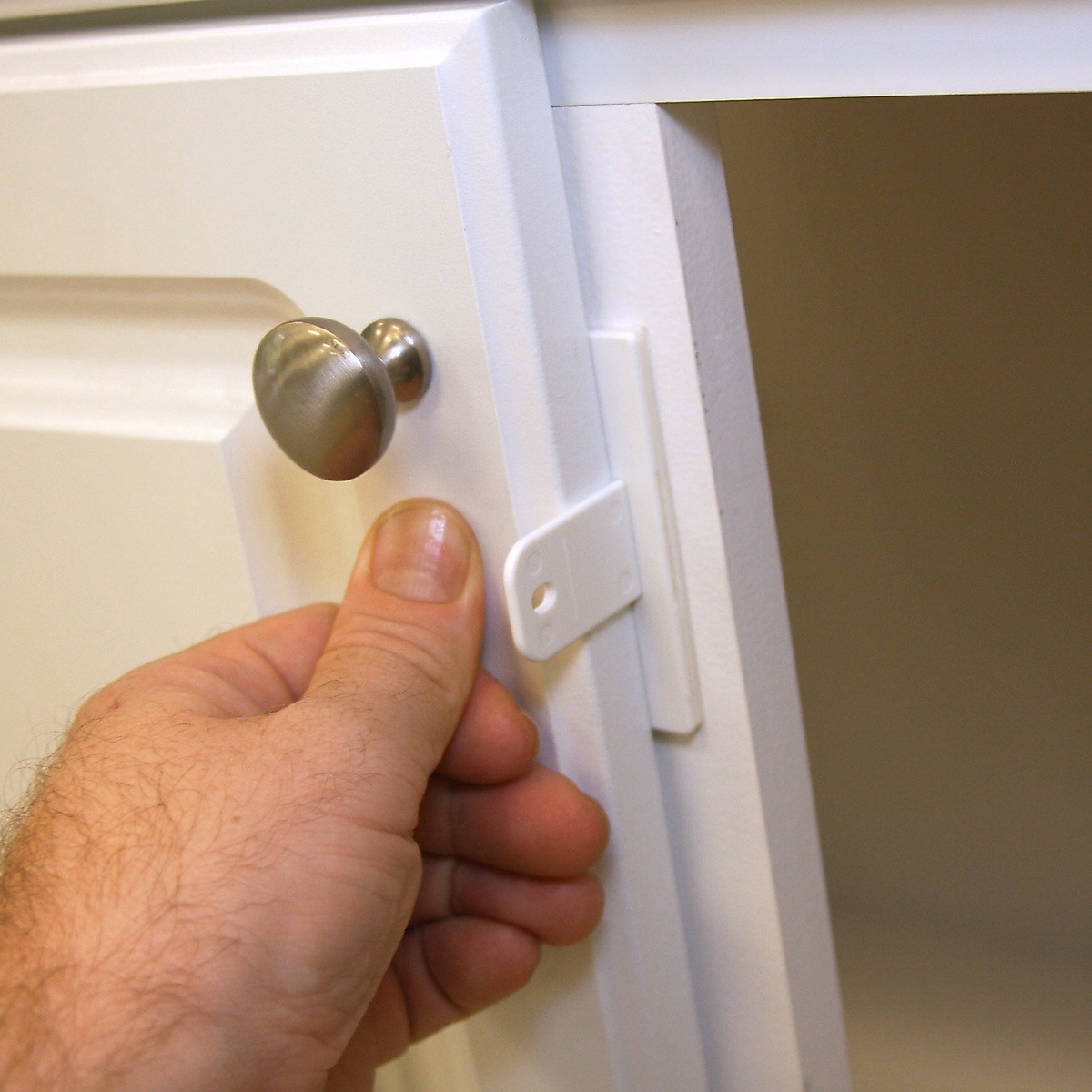 Qdos Safety Adhesive Double Door Cabinet Lock | White | Easy One Handed Operation - Patented ZeroPinch Design - Only Fits Standard Framed Cabinets and Furniture - Baby Proofing Doesn't Have to be Ugly