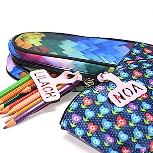 Custom silicone tags with your name. Ideal for backpacks, handbags, suitcases, and pencil cases. Easy to use, elastic, and durable. Pack of 2 units.