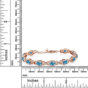 Gem Stone King 18K Rose Gold Plated Silver Oval Swiss Blue Topaz Tennis Bracelet For Women (9.65 Cttw, Gemstone Birthstone, 7 Inch With 1 Inch Extender)