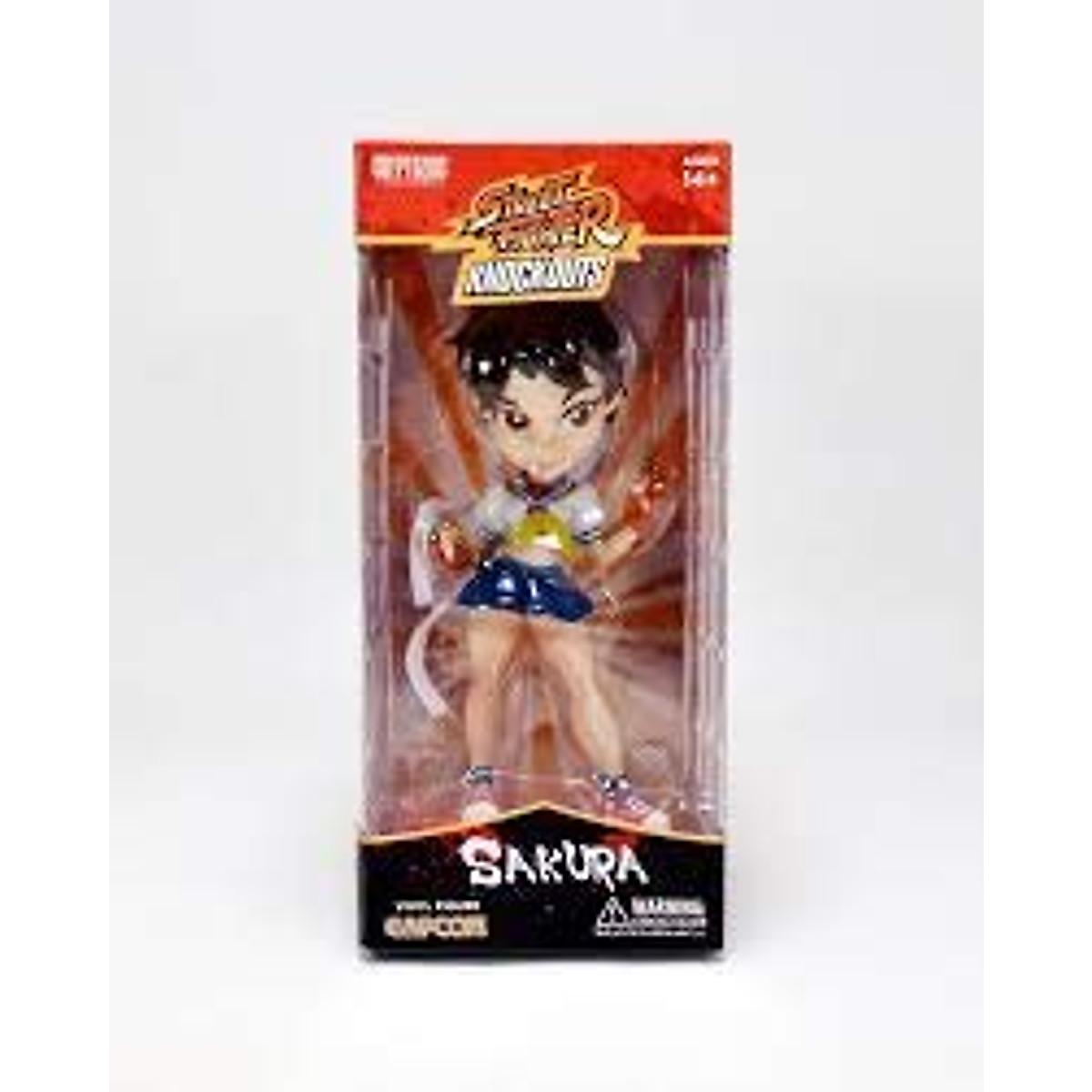 Cryptozoic Street Fighter Knockouts Series 1: Sakura Vinyl Figure, 7.5 inches
