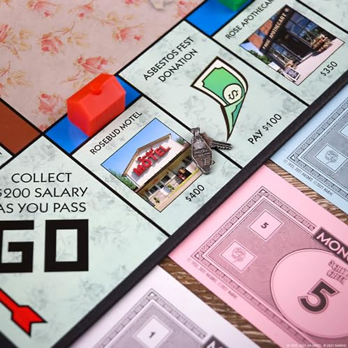 Monopoly Schitt's Creek | Game Tokens Include Bebe Crow, Patrick's Guitar, Rosebud Motel Key & More | Officially Licensed and Collectible Monopoly Game Based on Award Winning Series Schitt's Creek