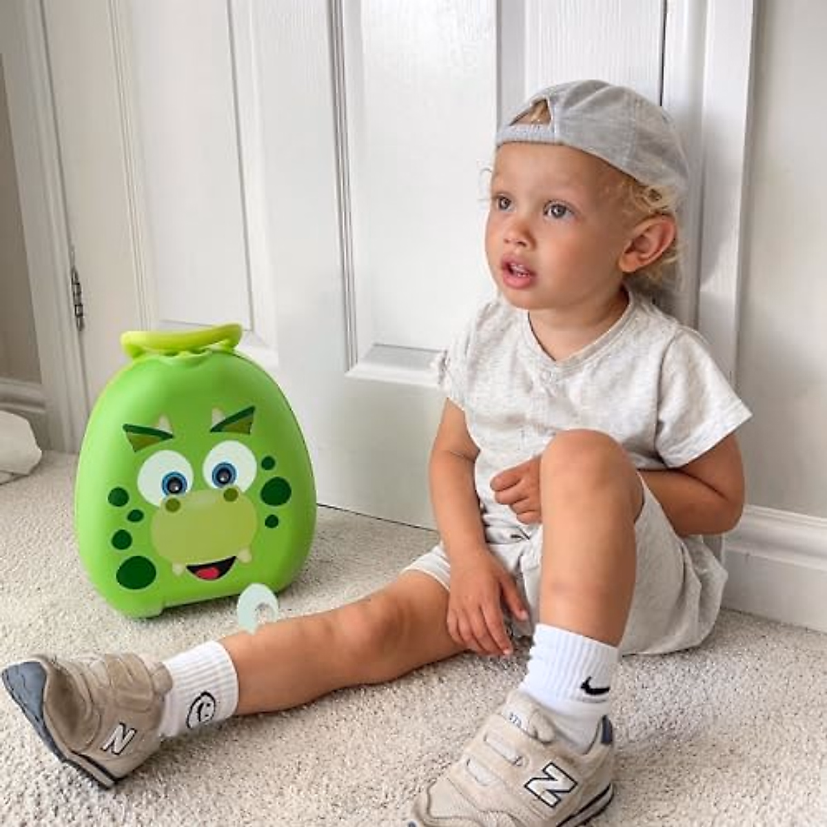 My Carry Potty - Dinosaur Travel Potty, Award-Winning Portable Toddler Toilet Seat for Kids to Take Everywhere