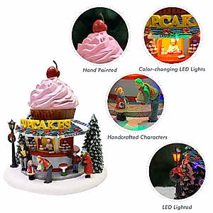 MOMENTS IN TIME Christmas Village Building, Cupcake Shop with LED Lights and Christmas Music - Battery Operated (not Included) (10.4" H x 9.5" W x 7.5" D)