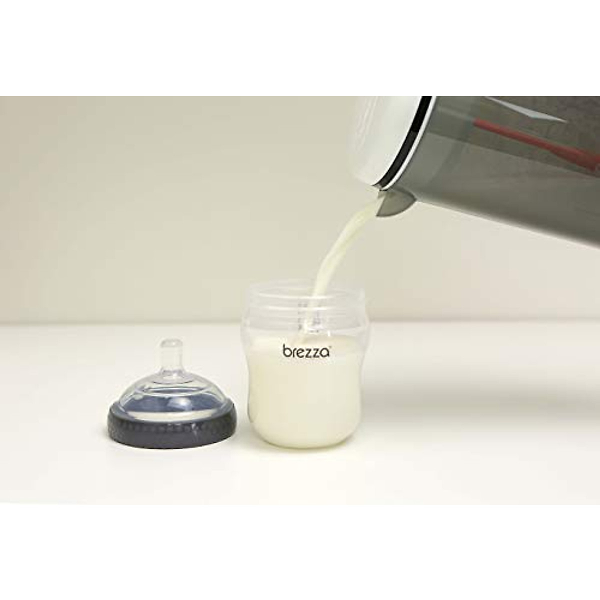 Baby Brezza Electric One Step Formula Mixer Pitcher - Motorized Mixing System for Infant Formula Powder - Large Capacity, Mix 28oz of Formula at Once - Portable for Travel