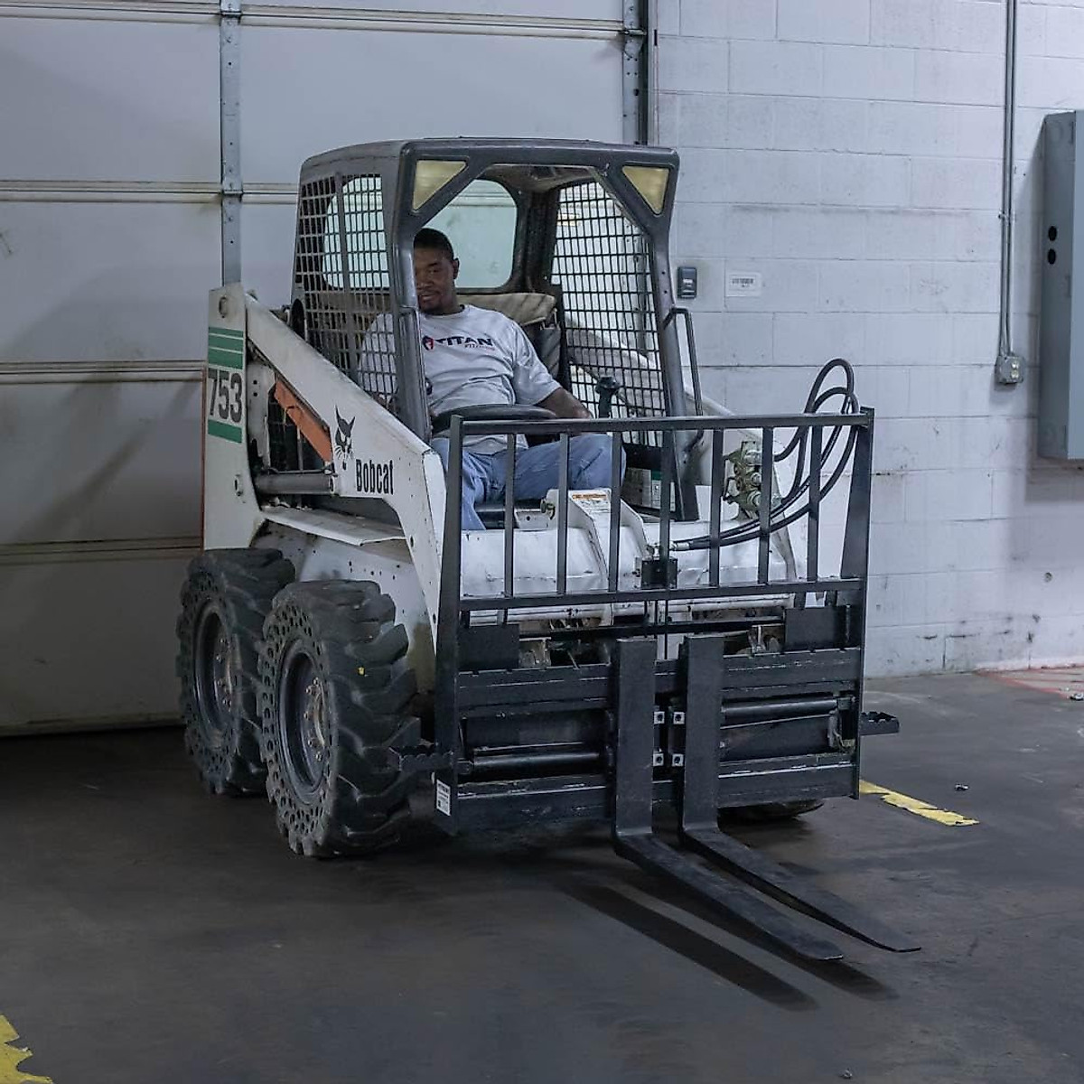 Titan Attachments Standard Series Adjustable Hydraulic Sliding Skid Steer Pallet Fork Frame, 4,000 LB Capacity, Adjusts 8in to 40in Hydraulically, Side Steps for Easy Entry, Quick Tach Mounting System