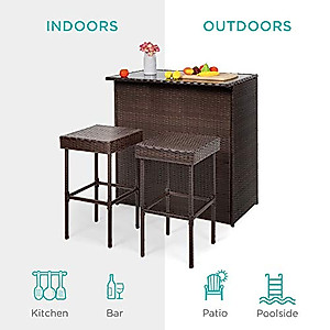 Best Choice Products 3-Piece All-Weather Wicker Bar Table Set for Indoor Outdoor, Kitchen, Patio, Backyard w/ 2 Stools, Glass Tabletop, Storage Shelves - Brown