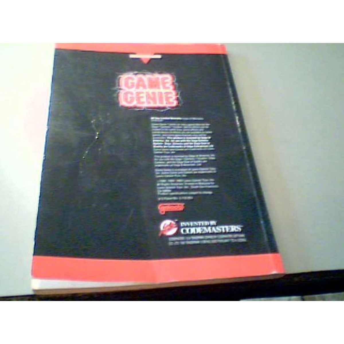 1990, 1991, 1992 Lewis Galoob Toys, Inc. Codemasters Software Co. Ltd. Galoob Video Game Enhancer for Sega Genesis---programming Manual and Codebook---softcover, 162 Pages, Sega Genesis Version