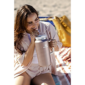 Stanley Quencher H2.0 FlowState Stainless Steel Vacuum Insulated Tumbler with Lid and Straw for Water, Iced Tea or Coffee, Smoothie and More, Rose Quartz Glow, 64 oz
