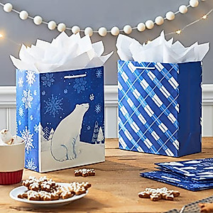 Hallmark 9" Medium Winter Gift Bags (4 Bags: Blue with Snowflakes, Plaid, Polar Bear, Christmas Trees) for Christmas, Hanukkah, Birthdays