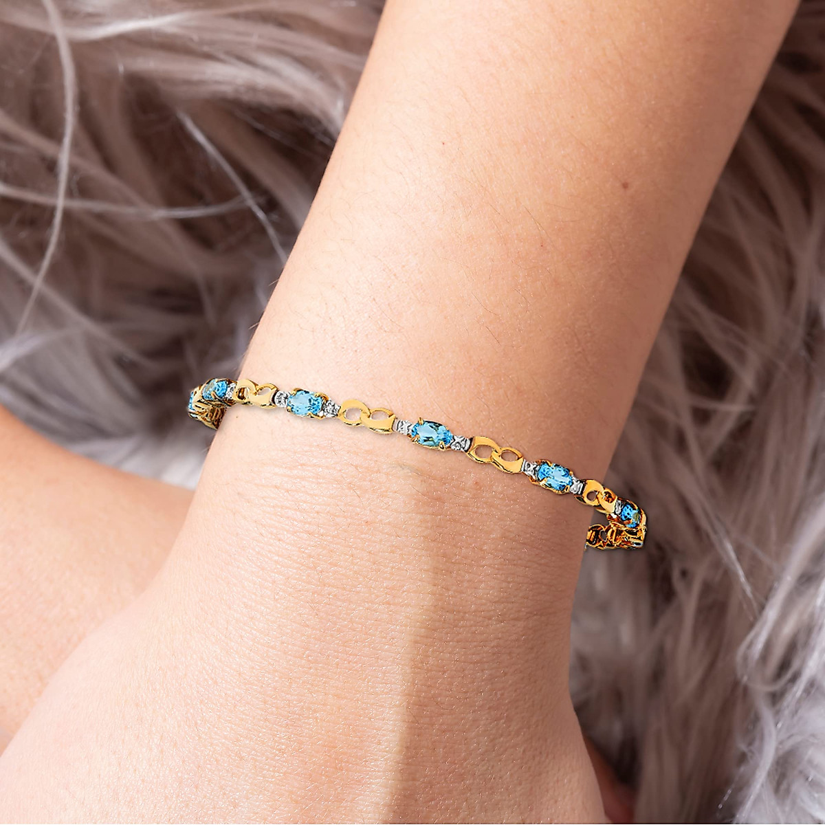 10k Yellow Gold Oval Blue Topaz and Diamond Accent Infinity Link Bracelet