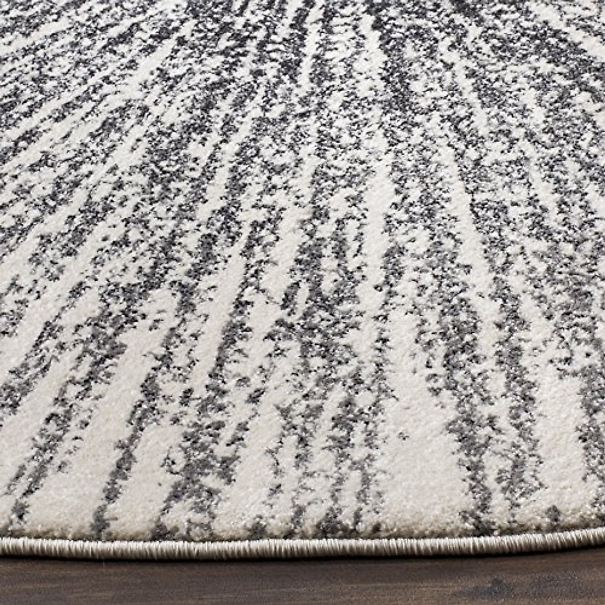 SAFAVIEH Evoke Collection Area Rug - 8' Round, Black & Ivory, Abstract Burst Design, Non-Shedding & Easy Care, Ideal for High Traffic Areas in Living Room, Bedroom (EVK228K)