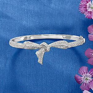 Ross-Simons 0.15 ct. t.w. Diamond Bow Bangle Bracelet in Sterling Silver. 7 inches