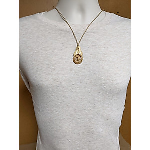 Earthbound Pacific Hand Carved Aged Bone Whale Tail Necklace with Infinity Loop and Spiral