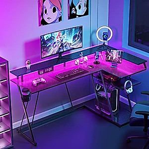 SEVEN WARRIOR L Shaped Gaming Desk with LED Lights & Power Outlets, 55” Reversible Corner Desk with Storage Shelf, Computer Desk with Monitor Stand, Gaming Table with Cup Holder, with Hooks, Black