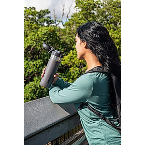 Stanley Quick Flip GO Water Bottle 24 OZ / 0.71 L | Push Button Lid | Leakproof & Packable for Travel & Sports | Insulated Stainless Steel | BPA-Free | Charcoal