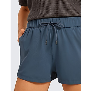 CRZ YOGA Stretch Shorts for Women Work Casual 2.5'' - Athletic Shorts with Pockets for Workout Travel Hiking Golf Slate Blue Large