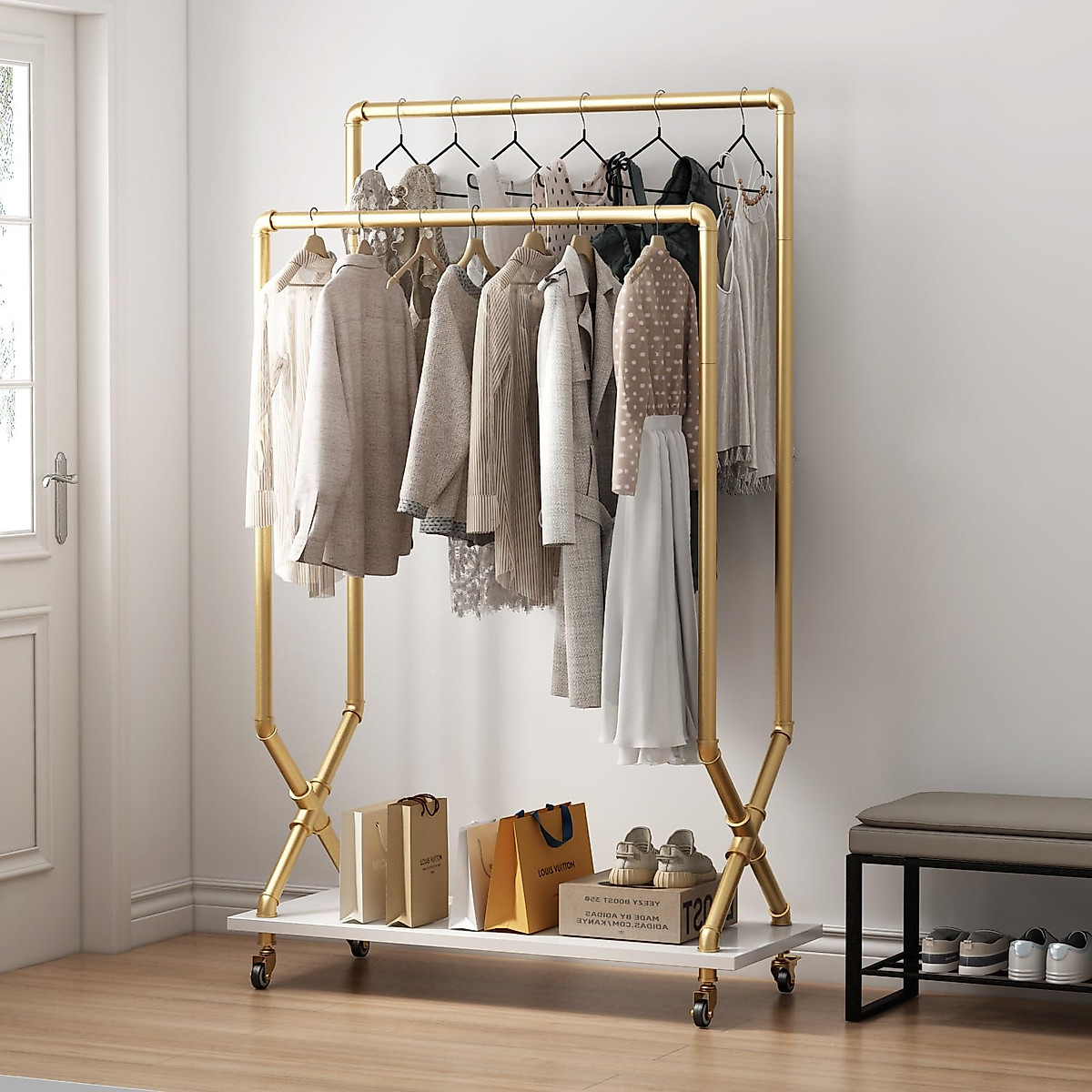 ORSENIGO Industrial Pipe Clothing Rack with Double Rods for Hanging Clothes, Heavy Duty Rolling Clothes Rack with Shelf for Home Boutique Retail Use (Gold)