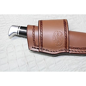 CARL THOMAS LEATHERS Crossdraw knife sheath. quality leather quality stitching. fix blade Nylon stitching. may defeat a 103. Knife holder.
